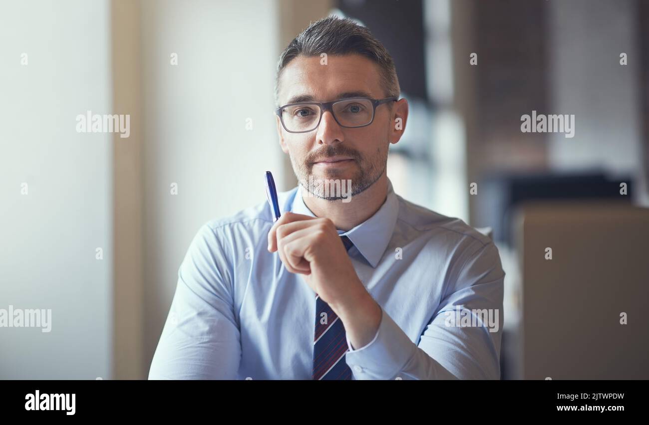 Portrait businessman sitting hi-res stock photography and images - Alamy