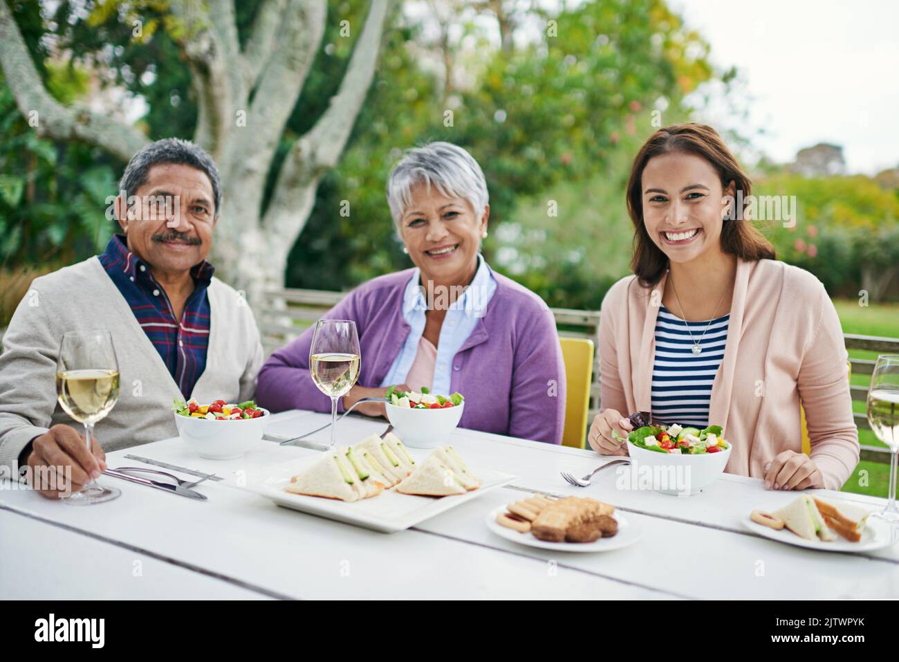 Enjoying favourite meal together hi-res stock photography and images ...
