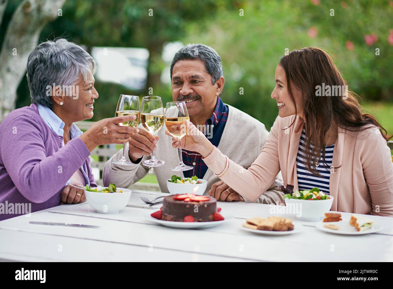 Hes a jolly good fellow indeed. a family enjoying a birthday lunch ...