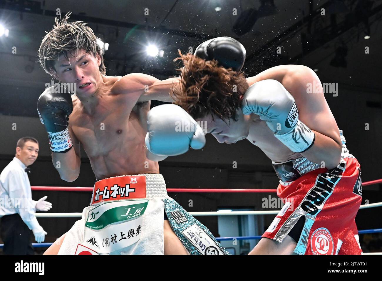 Tokyo, Japan. 30th Aug, 2022. Yoshimitsu Kimura (black gloves) and ...