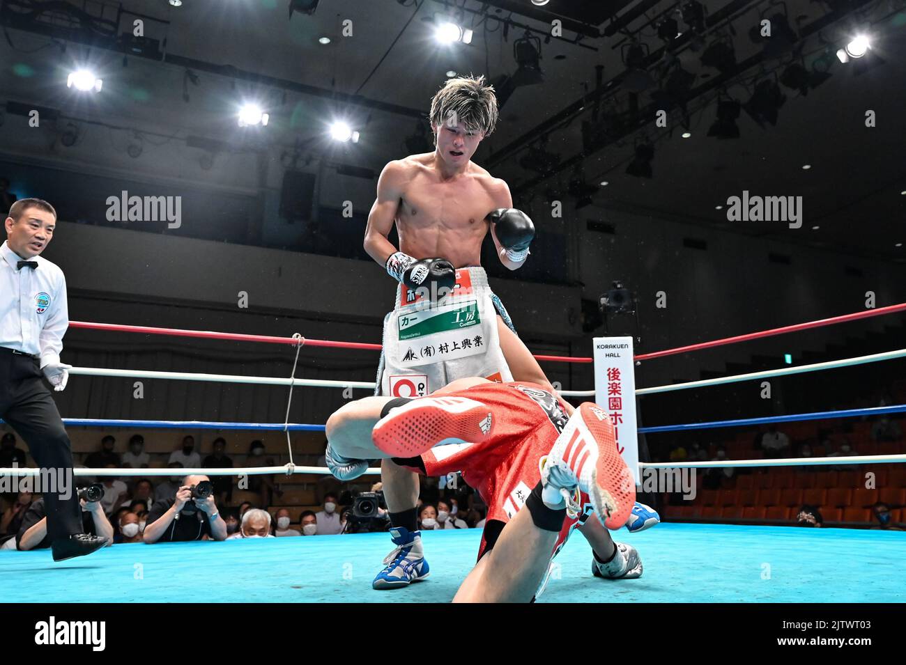 Tokyo, Japan. 30th Aug, 2022. Yoshimitsu Kimura (black gloves) and ...