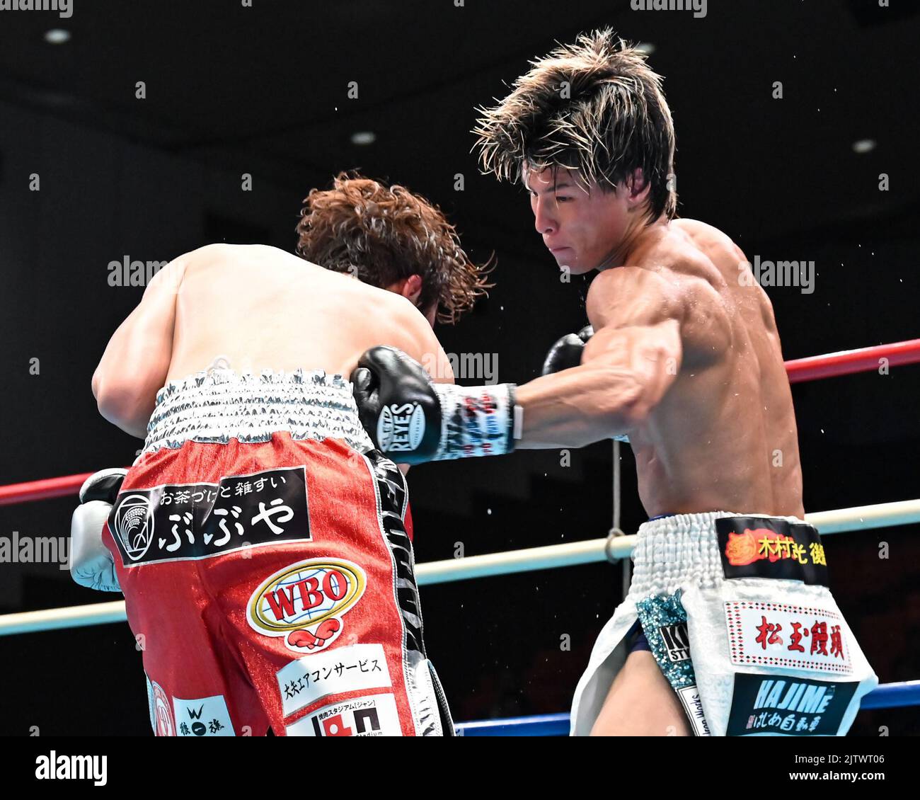 Tokyo, Japan. 30th Aug, 2022. Yoshimitsu Kimura (black gloves) and ...