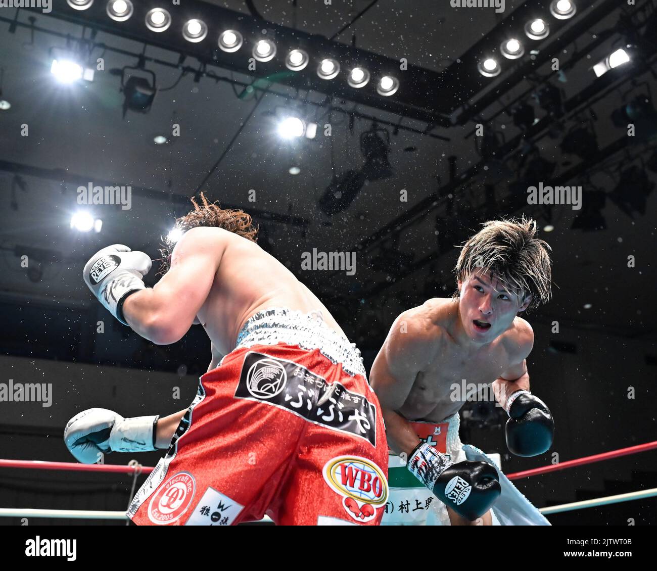 Tokyo, Japan. 30th Aug, 2022. Yoshimitsu Kimura (black gloves) and ...