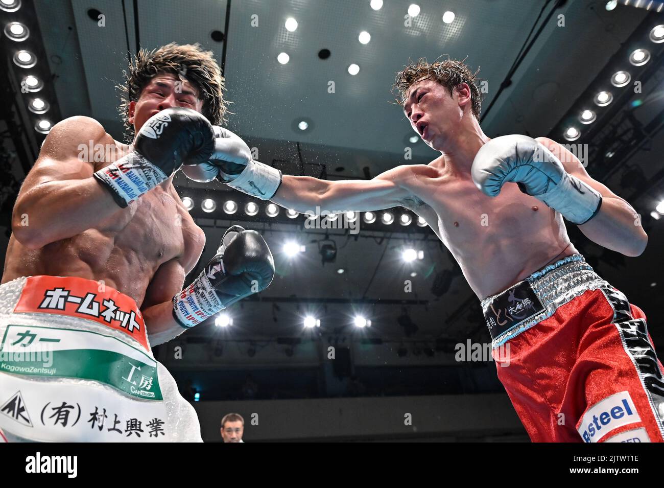 Tokyo, Japan. 30th Aug, 2022. Yoshimitsu Kimura (black gloves) and ...
