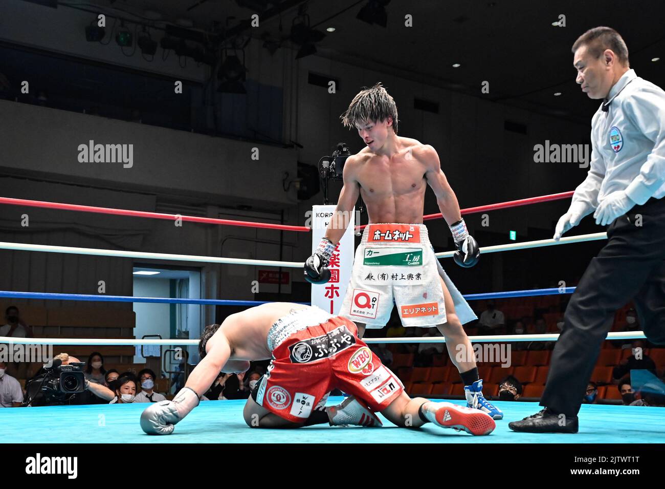 Tokyo, Japan. 30th Aug, 2022. Yoshimitsu Kimura (black gloves) and ...