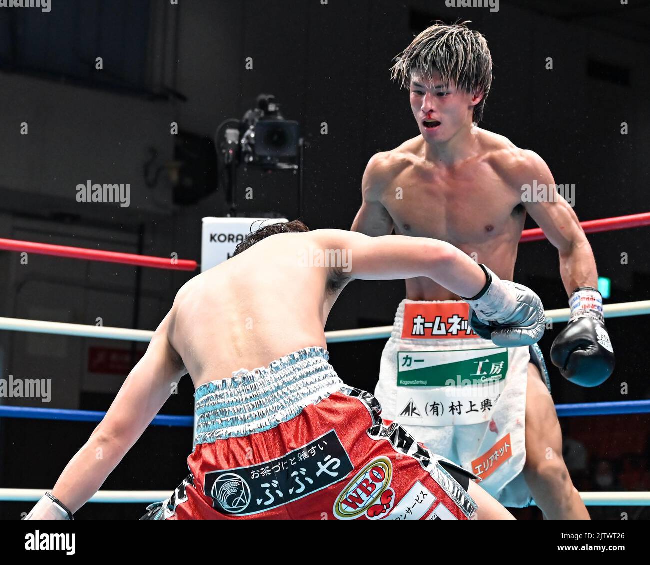 Tokyo, Japan. 30th Aug, 2022. Yoshimitsu Kimura (black gloves) and Kanehiro Nakagawa (silver ...