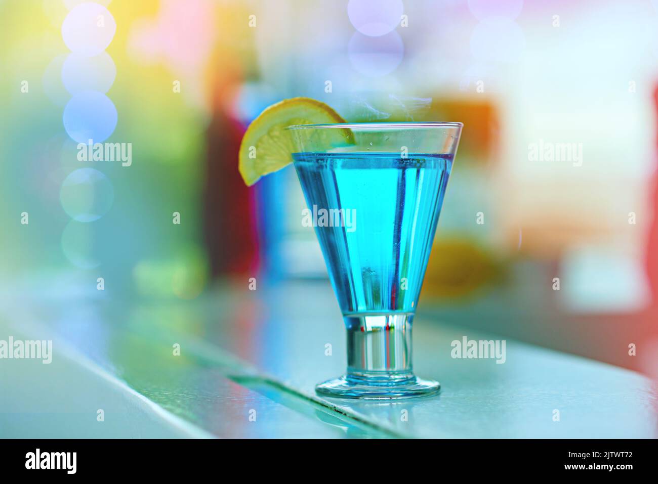 Cool blue cocktail deliciousness. a blue cocktail on a table in a ...