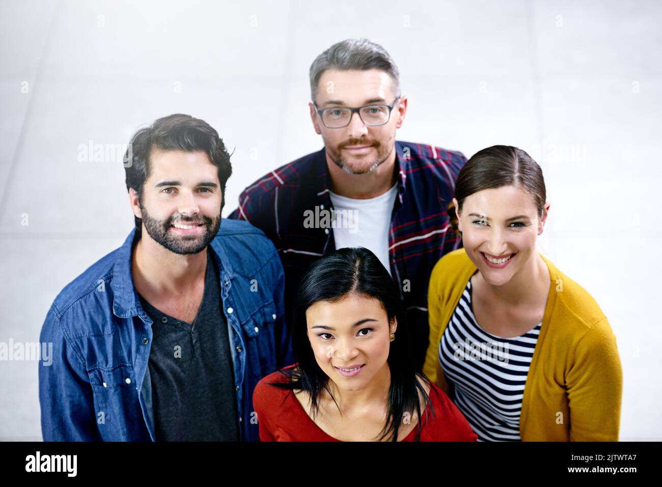Group of creatives standing hi-res stock photography and images - Alamy