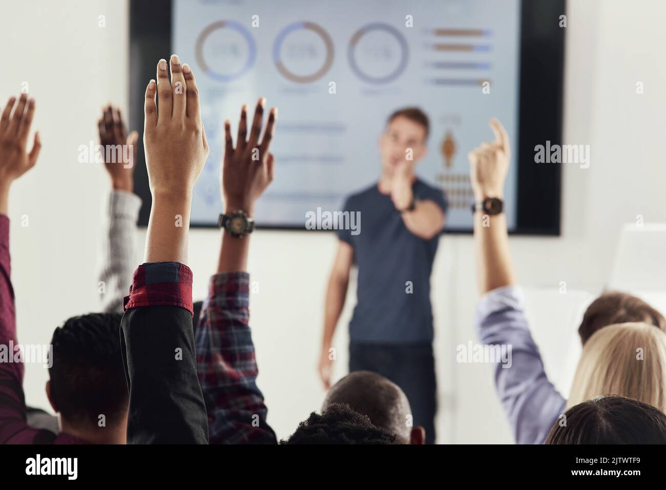 Business person raising hand speaker hi-res stock photography and ...