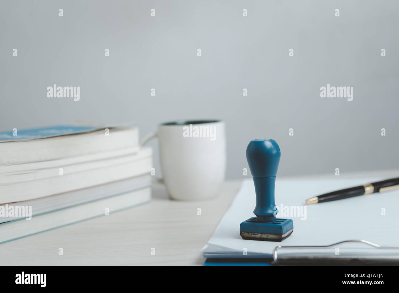 Business stamping approved on documents working in the office Stock ...