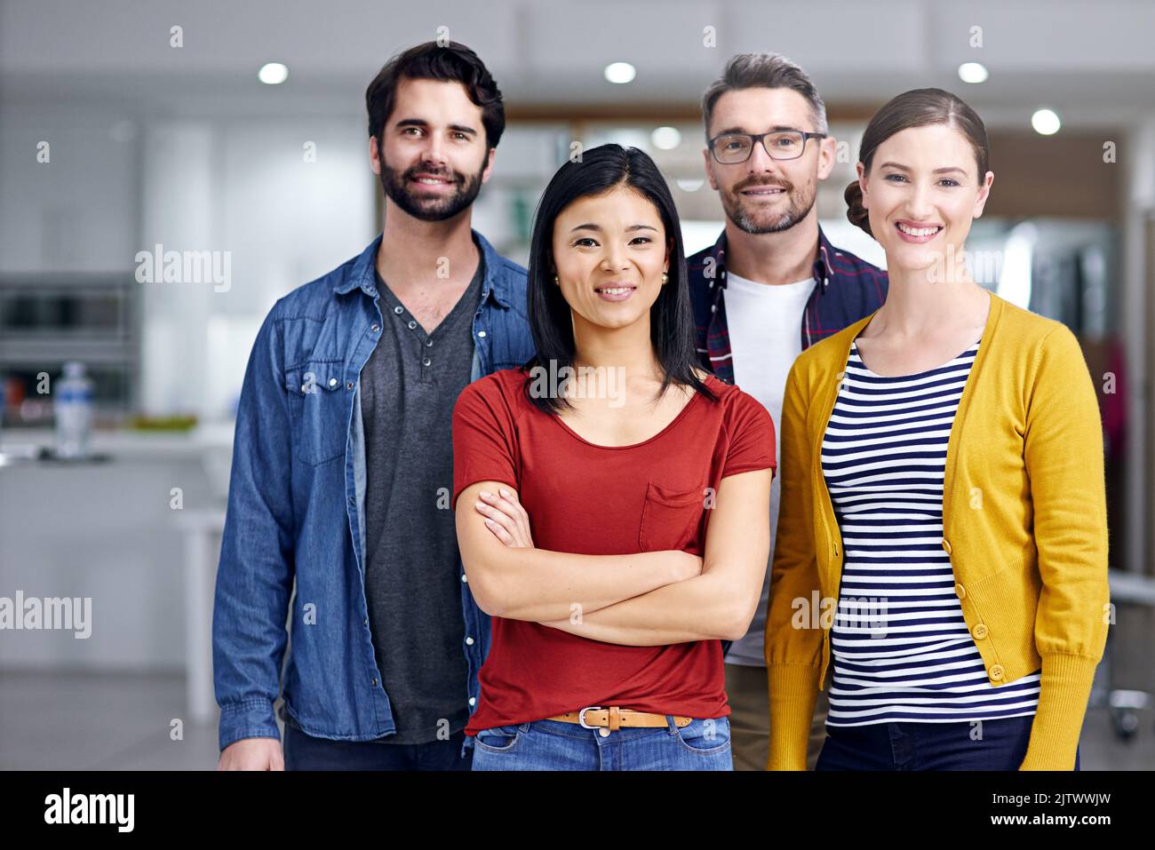 Lets achieve success together. Portrait of a group of creatives ...