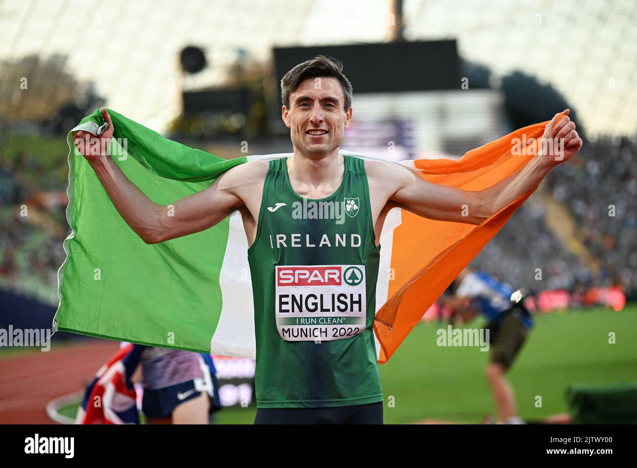 Mark English with her country's flag at the European Athletics ...