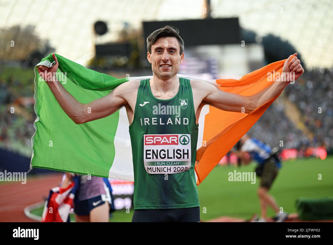 Mark English with her country's flag at the European Athletics ...