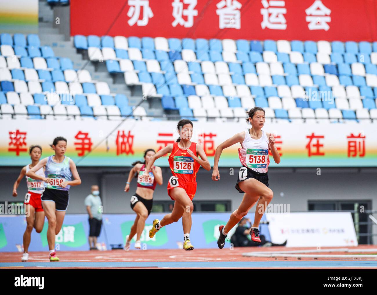TAIZOU, CHINA - SEPTEMBER 2, 2022 - Athletes compete in the women's 15 ...