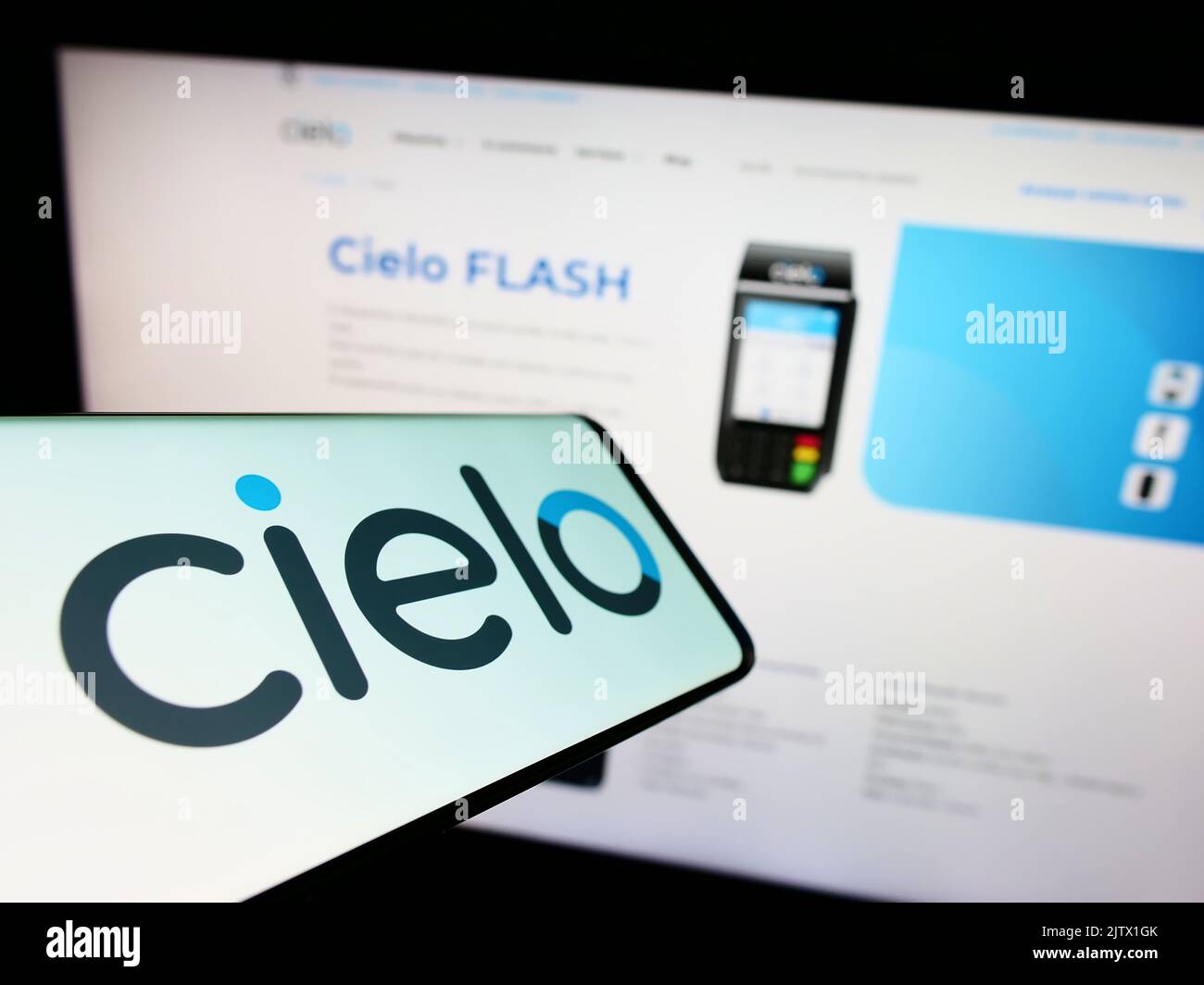 Mobile phone with logo of Brazilian payments company Cielo S.A. on screen in front of business ...