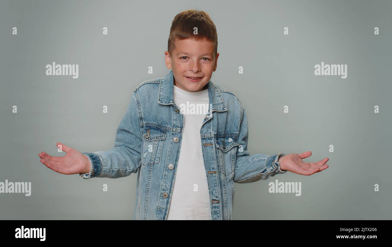 What Why. Sincere irritated toddler boy raising hands in indignant ...