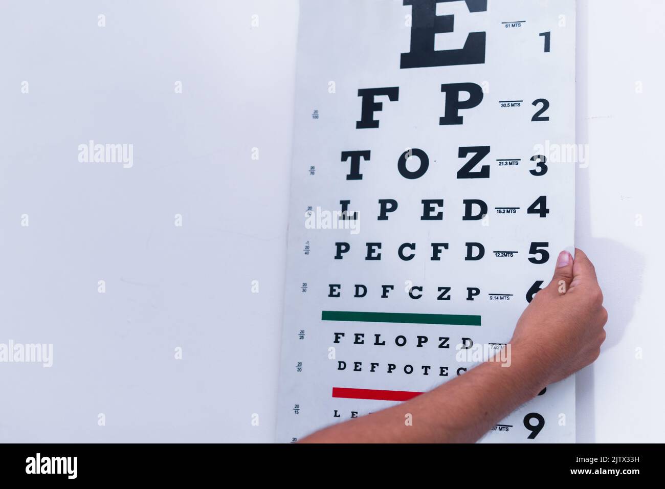 Chart or Snellen panel for vision. Eye chart with red and green lines ...