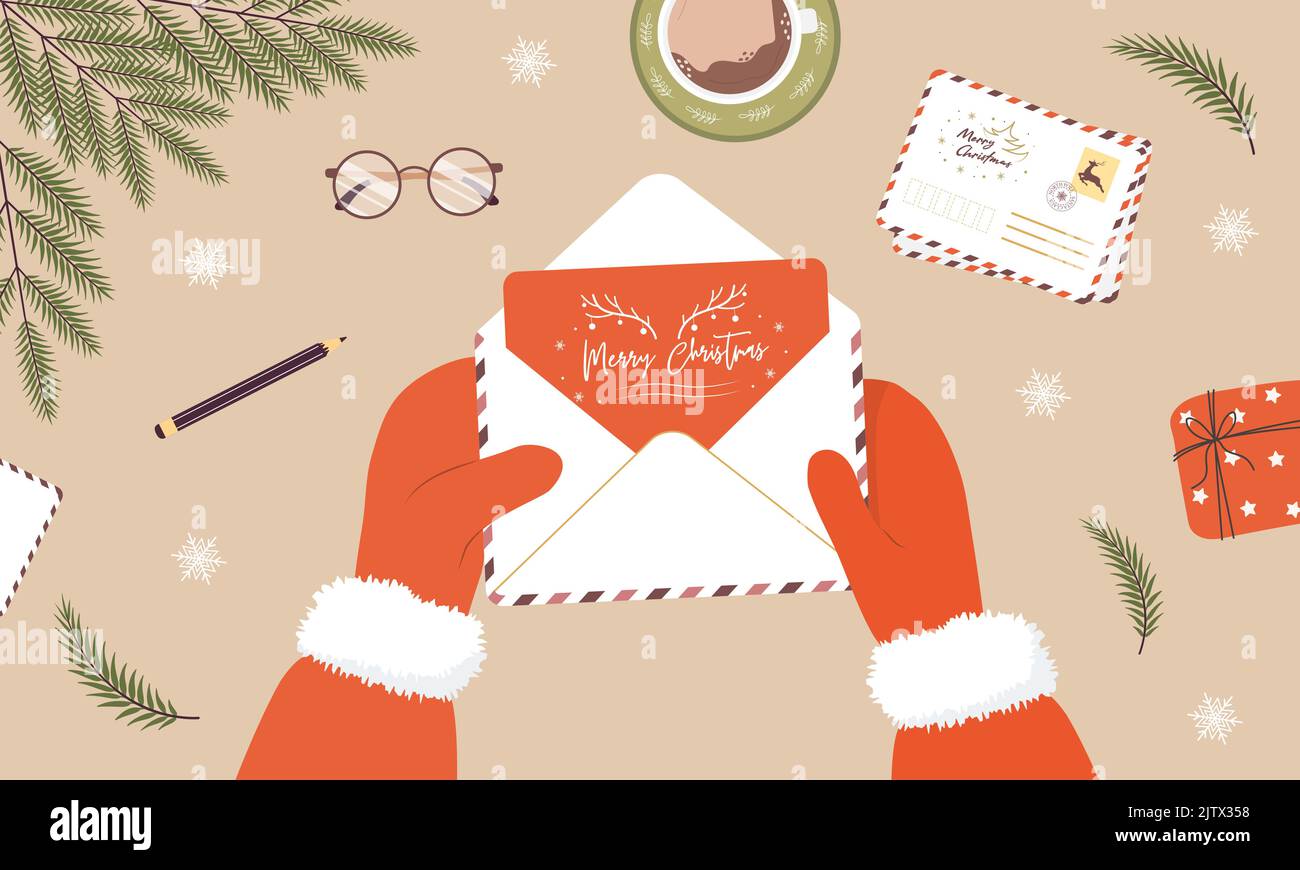 Santa claus hands holding envelope. Sending or receiving Christmas ...