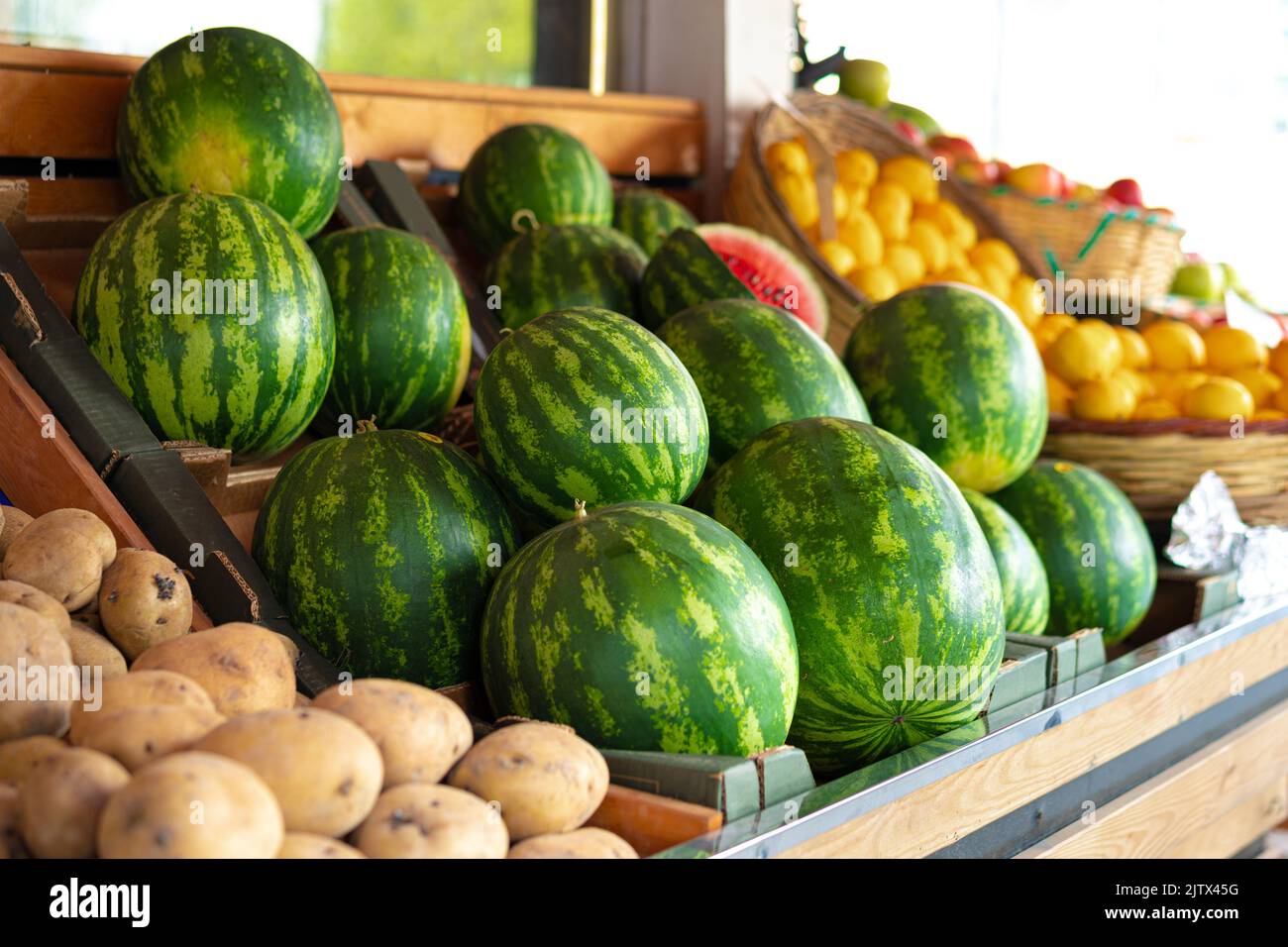 Fresh watermelon fruits at stall of grocery store Stock Photo - Alamy