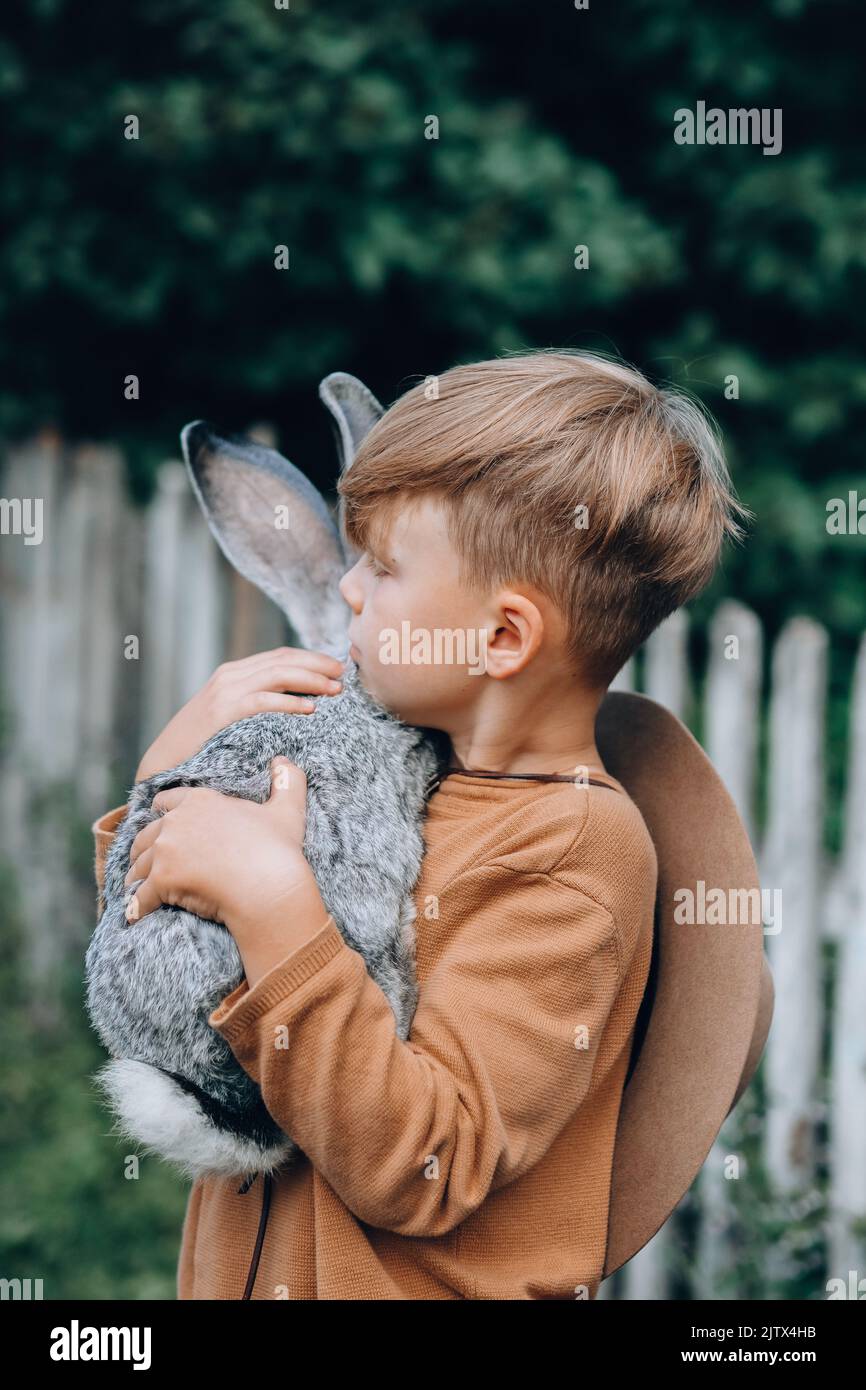 School kids at farm feeding animals hi-res stock photography and images ...