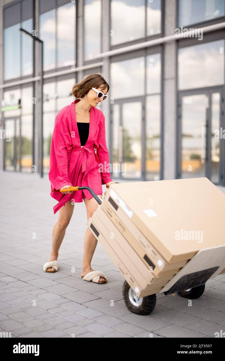 Woman carries furniture in hi-res stock photography and images - Alamy