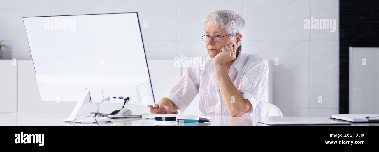 Sad Bored Employee Watching Virtual Presentation On Computer Stock ...