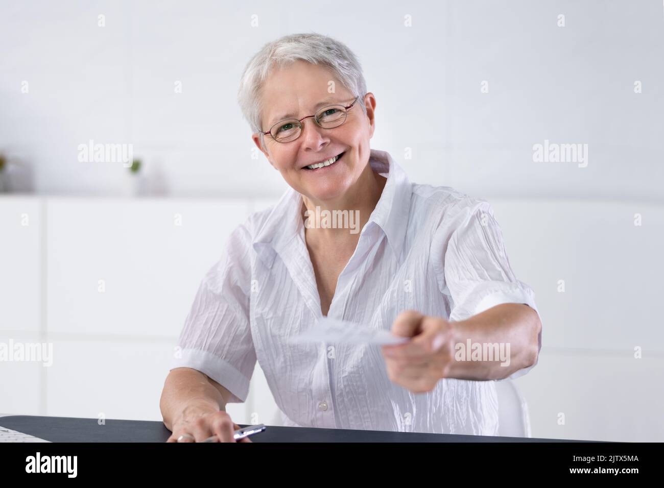 Executive Hand Giving Payment Check Or Compensation Cheque Stock Photo ...
