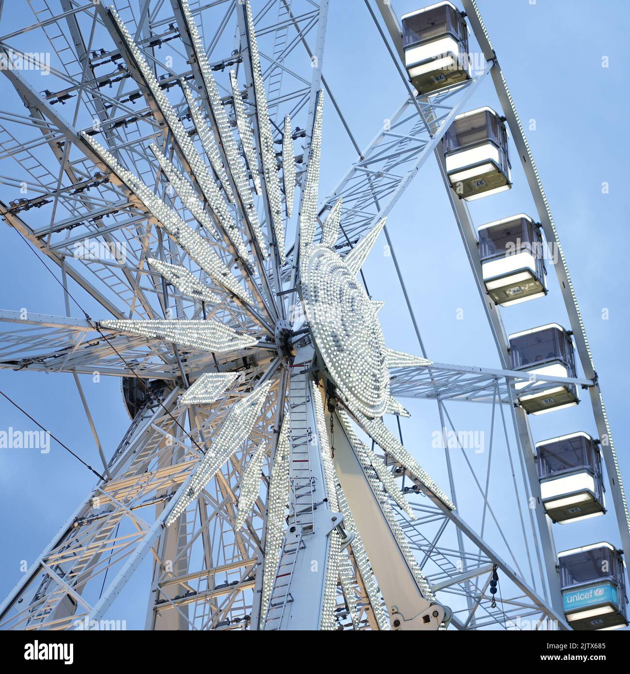 Tall ferris wheel in Budapest decorated with lit up cabins Stock Photo ...
