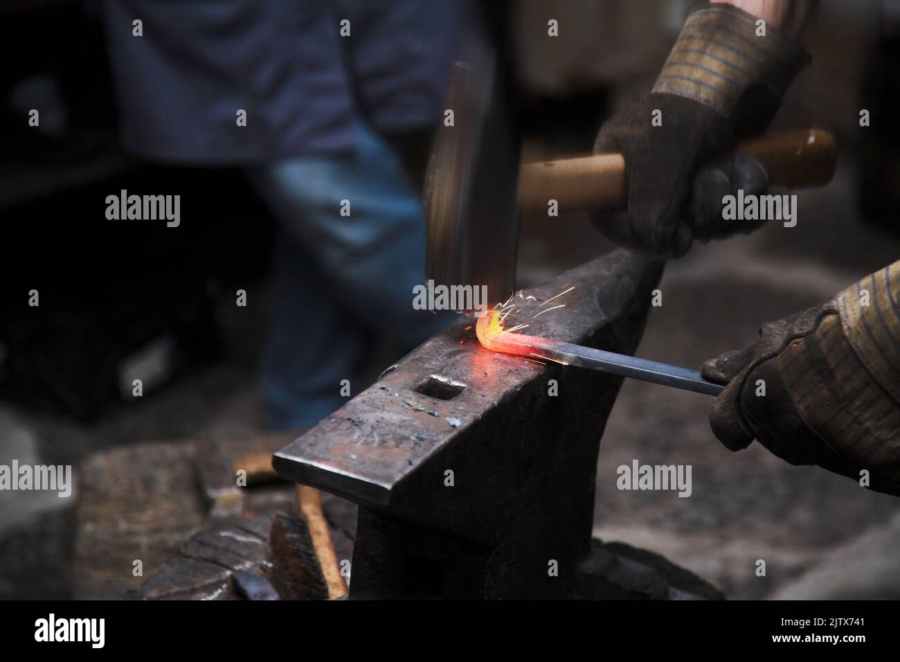 blacksmith at work close up Stock Photo - Alamy
