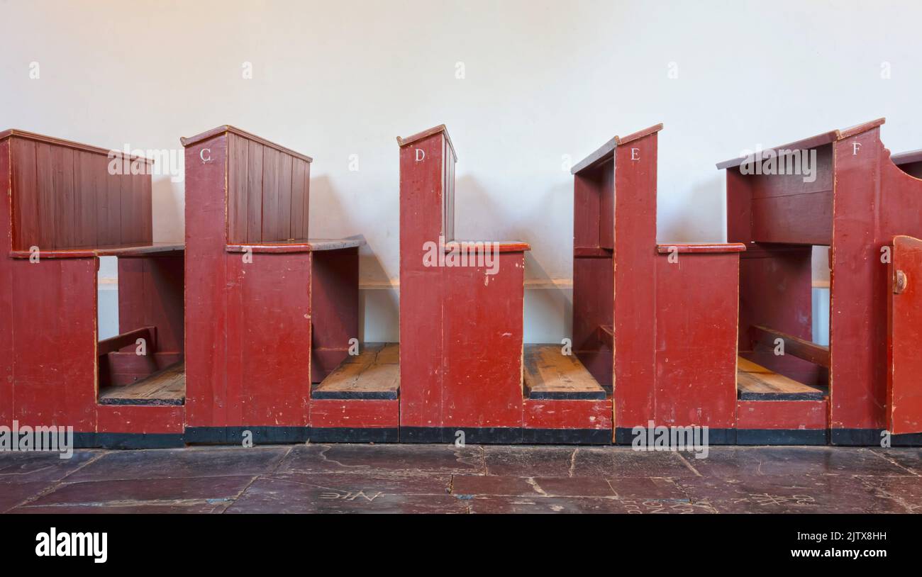 Red pews hi-res stock photography and images - Alamy