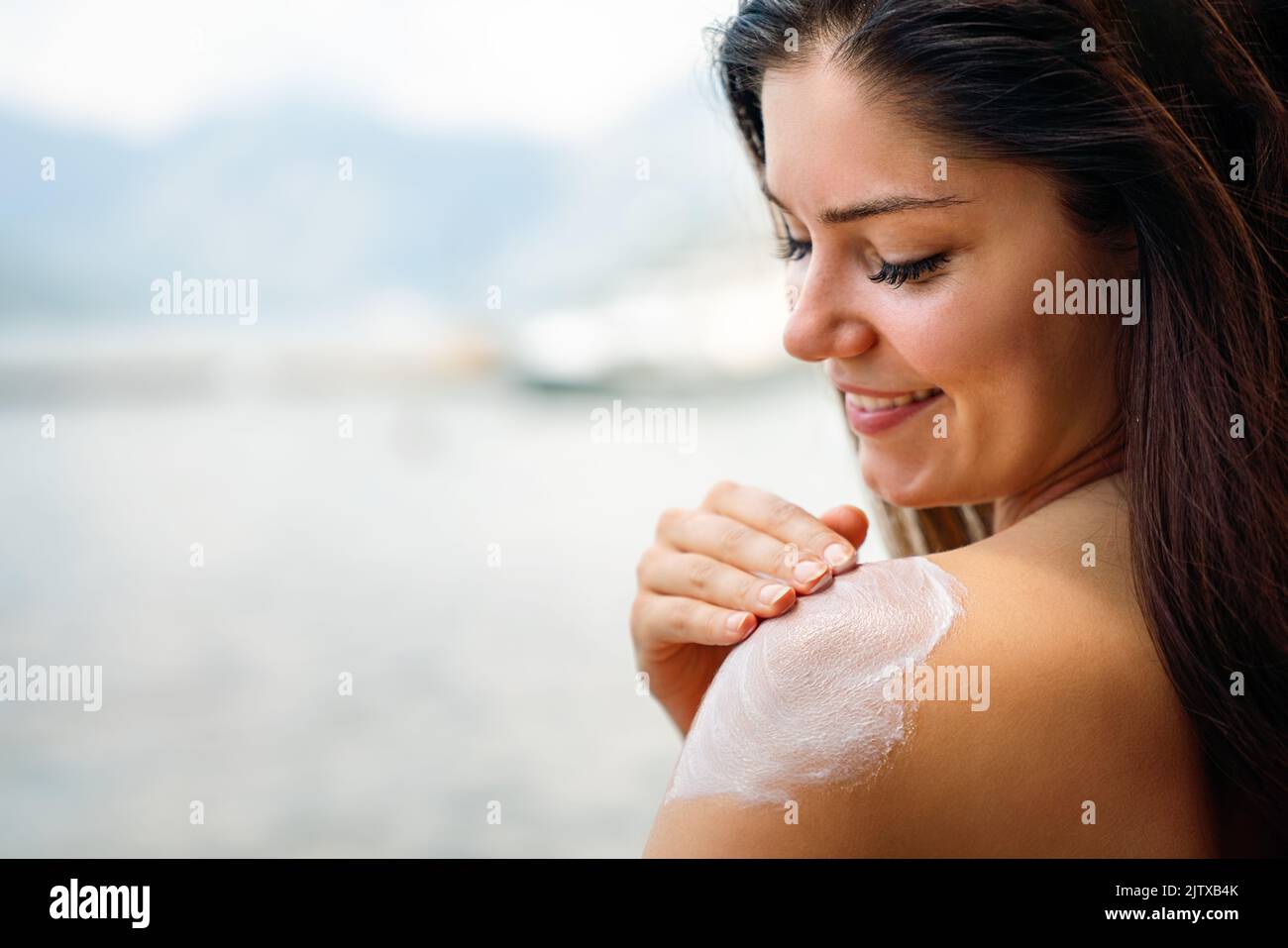 Woman face tanning hi-res stock photography and images - Alamy