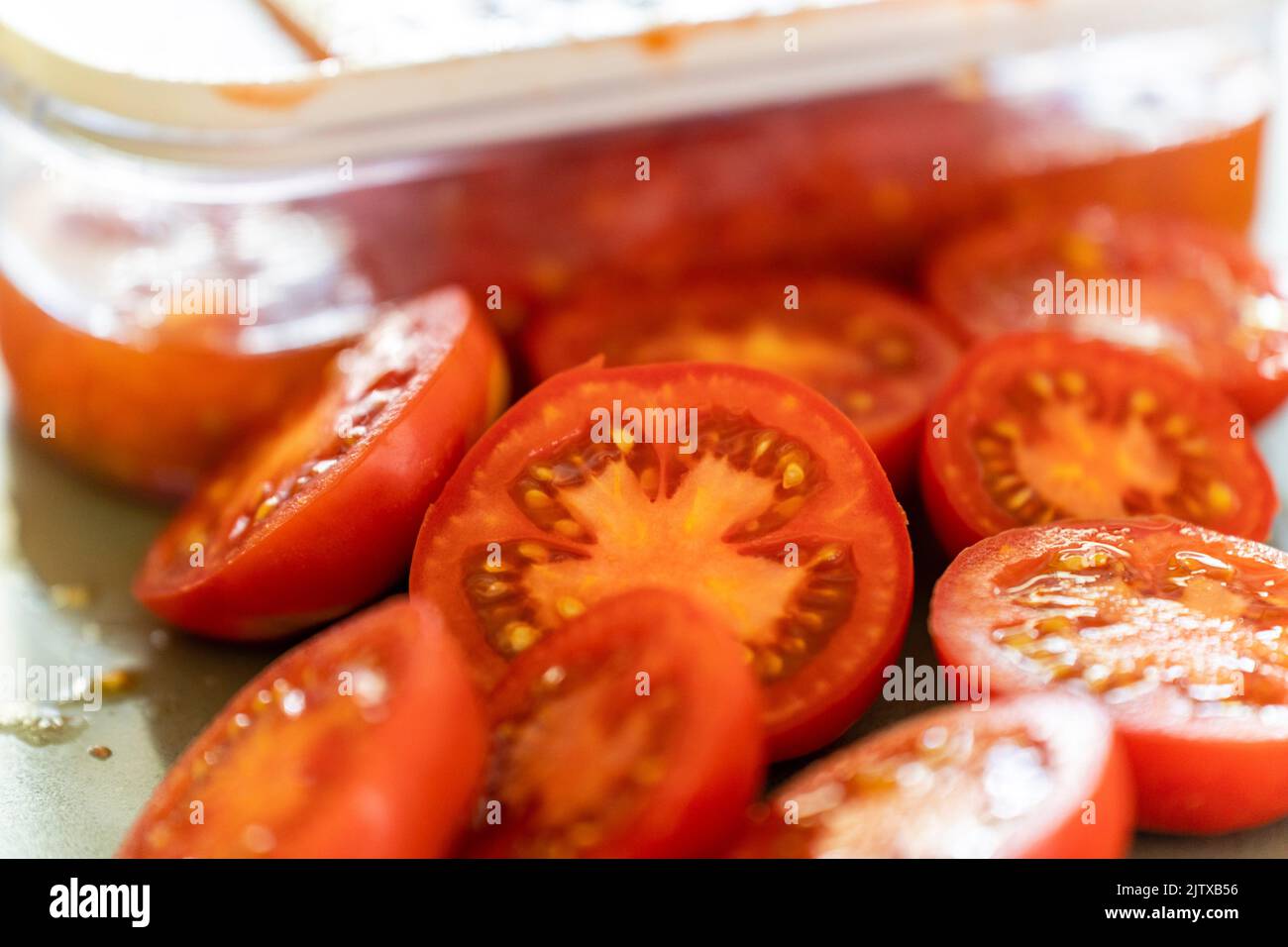 grating tomatoes for sauce, mallorca, spain Stock Photo - Alamy