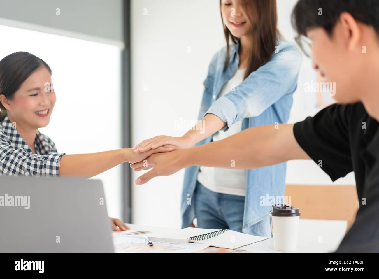 Design building concept, Architects team putting hand together to ...