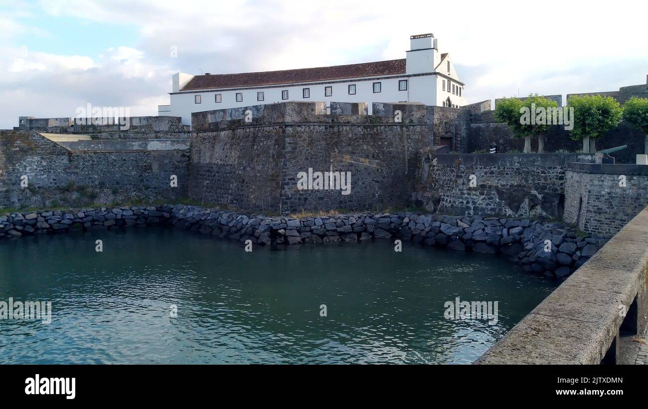 Sao Bras Fort, eastern elevation facing the harbor, early evening view ...