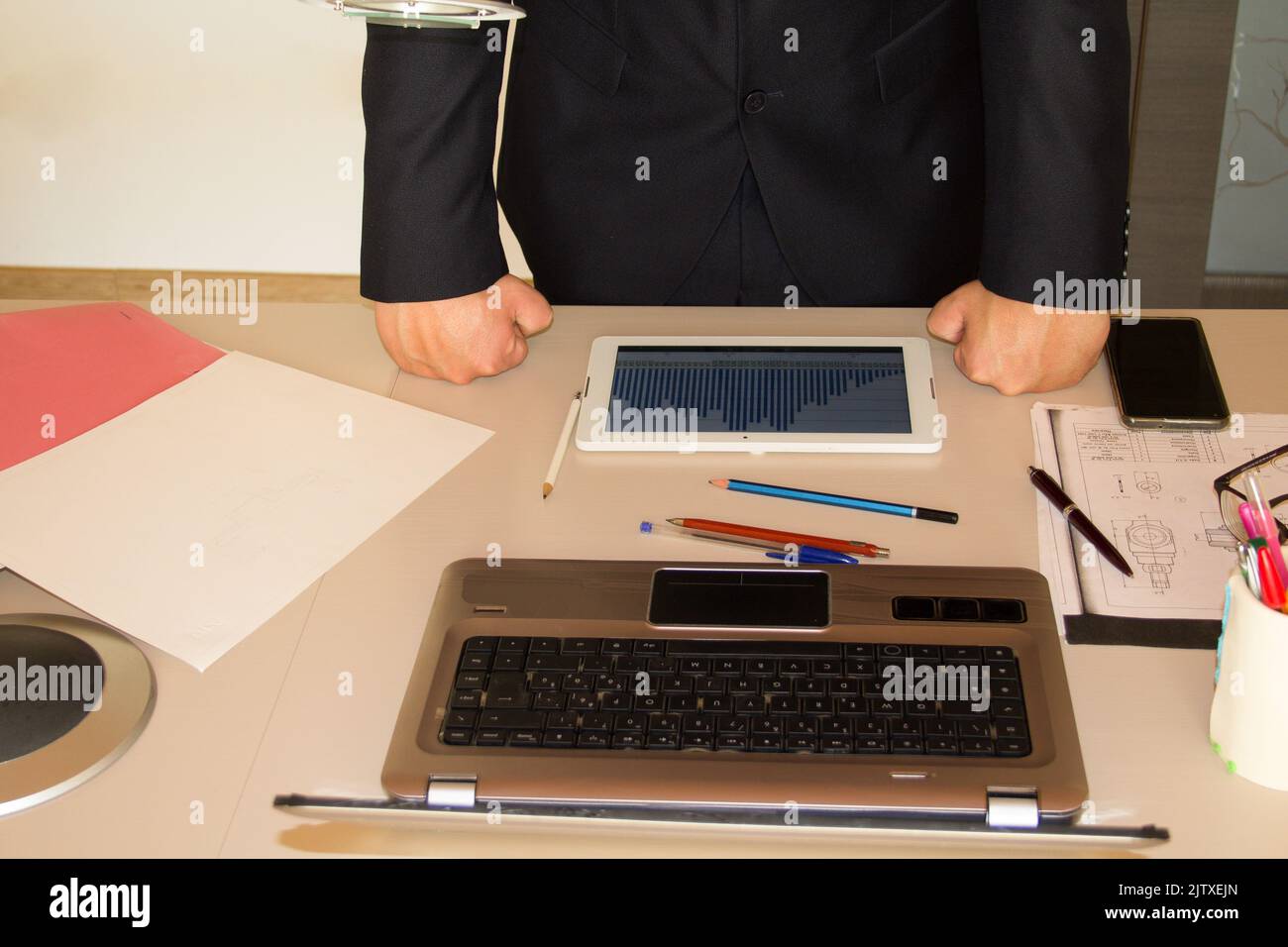 Angry businessman tablet laptop talking hi-res stock photography and ...