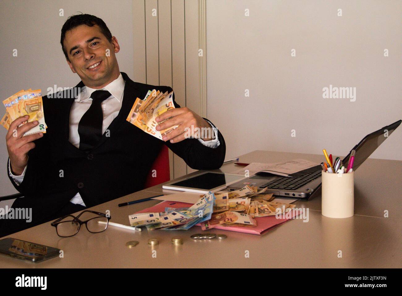 Mobile money suit hi-res stock photography and images - Alamy