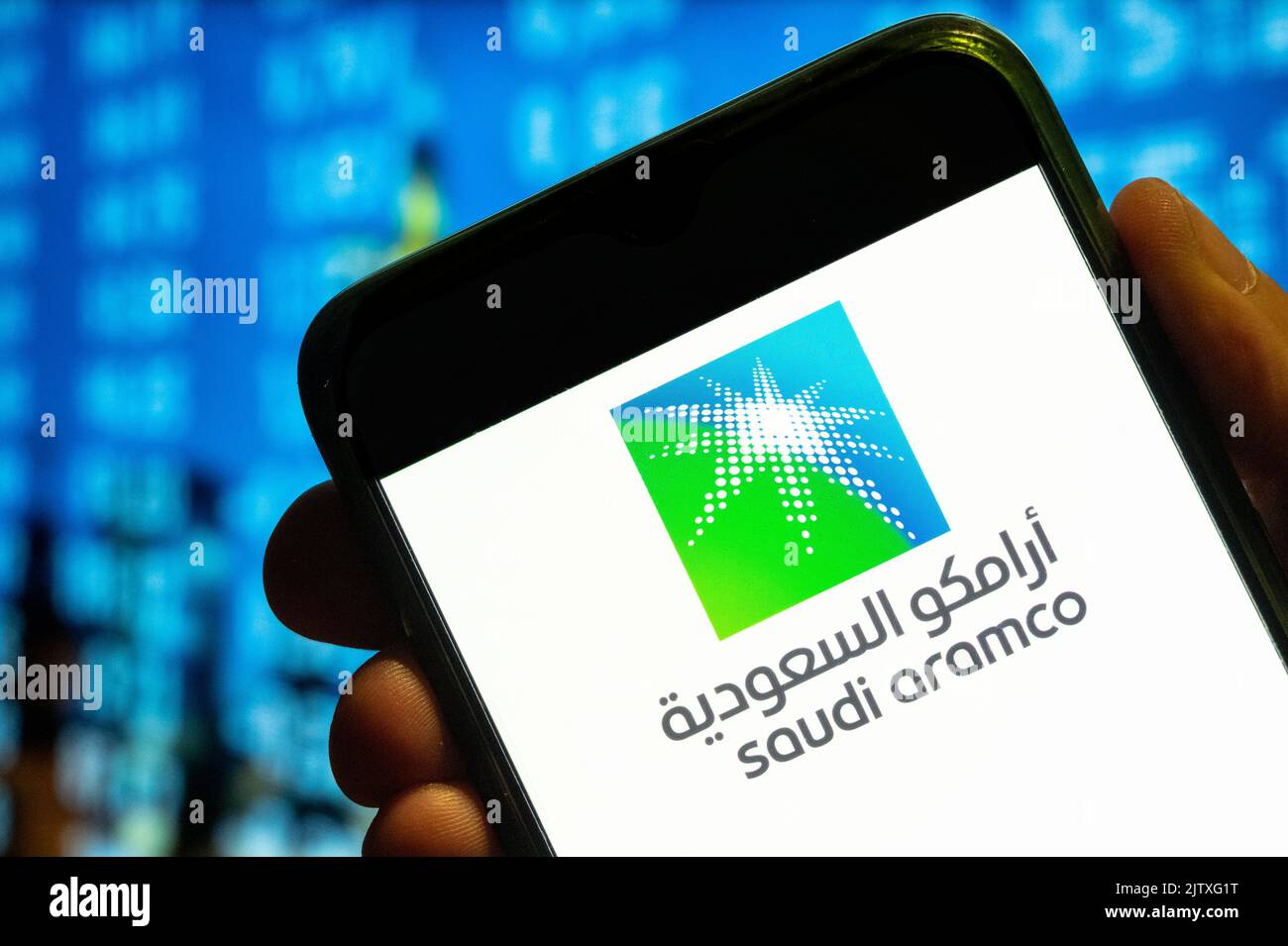 In this photo illustration, the Saudi Arabian Oil Company, Saudi Aramco ...