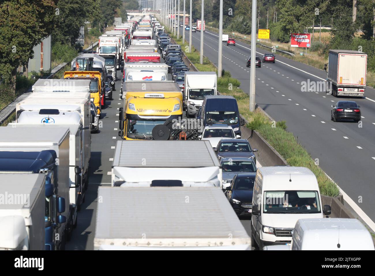 Illustration picture shows traffic congestion with lots of trucks and ...