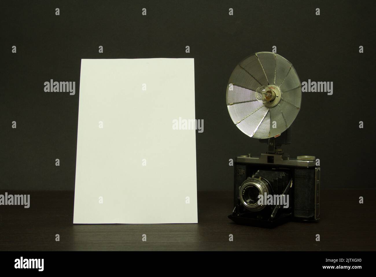 old vintage camera with flash and box to insert photos and text Stock ...