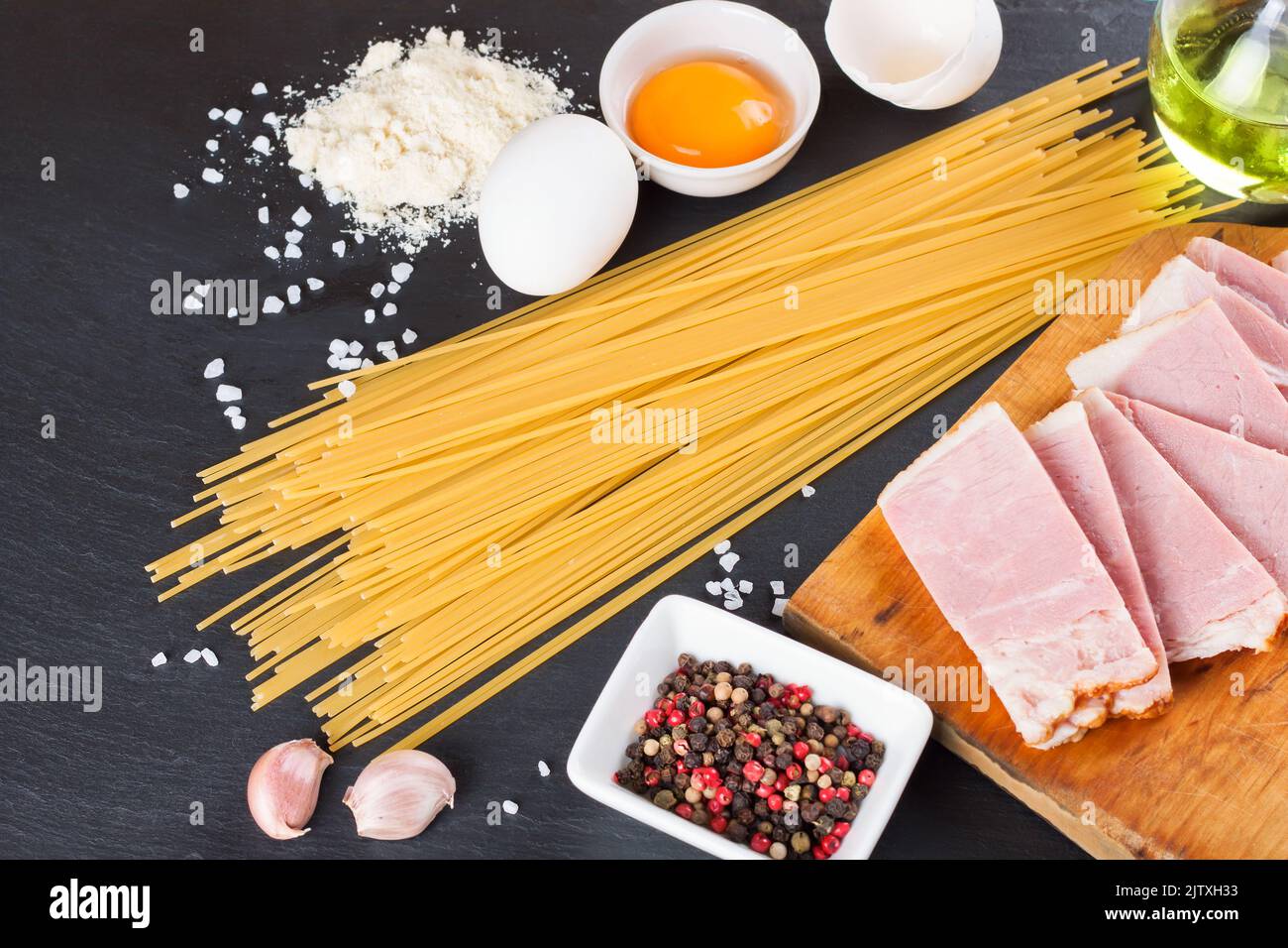 Ingredients for Pasta Carbonara on dark slate background. Spaghetti ...