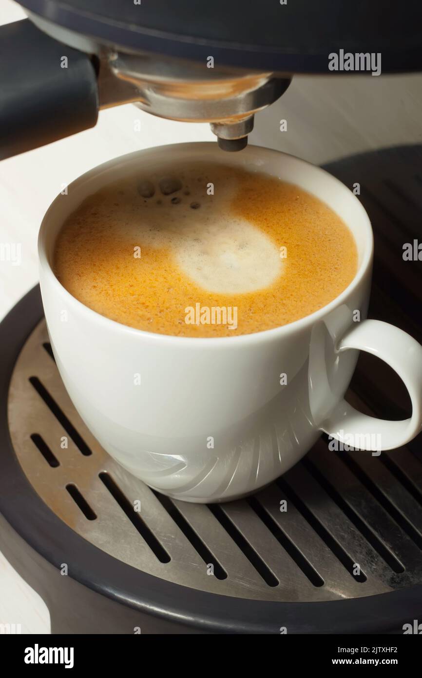 Coffee machine with transparent cup with fresh espresso. Process of ...