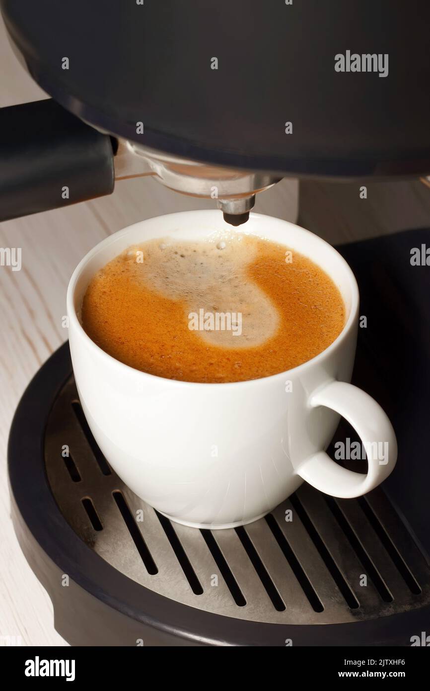 Coffee machine with transparent cup with fresh espresso. Process of ...