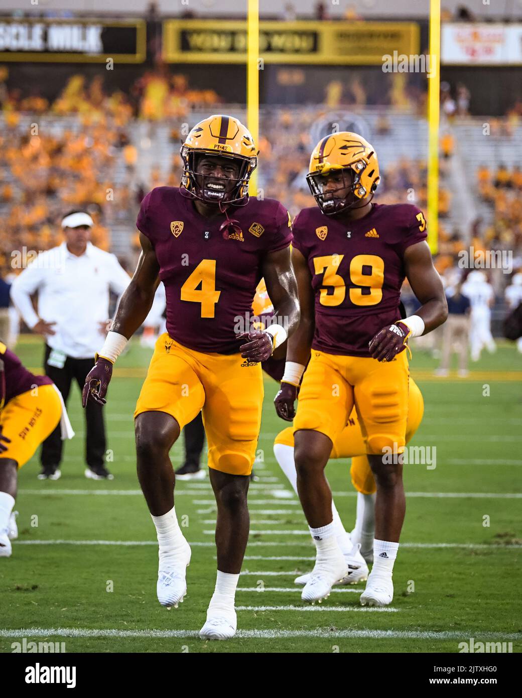 Arizona State running back Daniyel Ngata (4) warms up before an NCAA ...