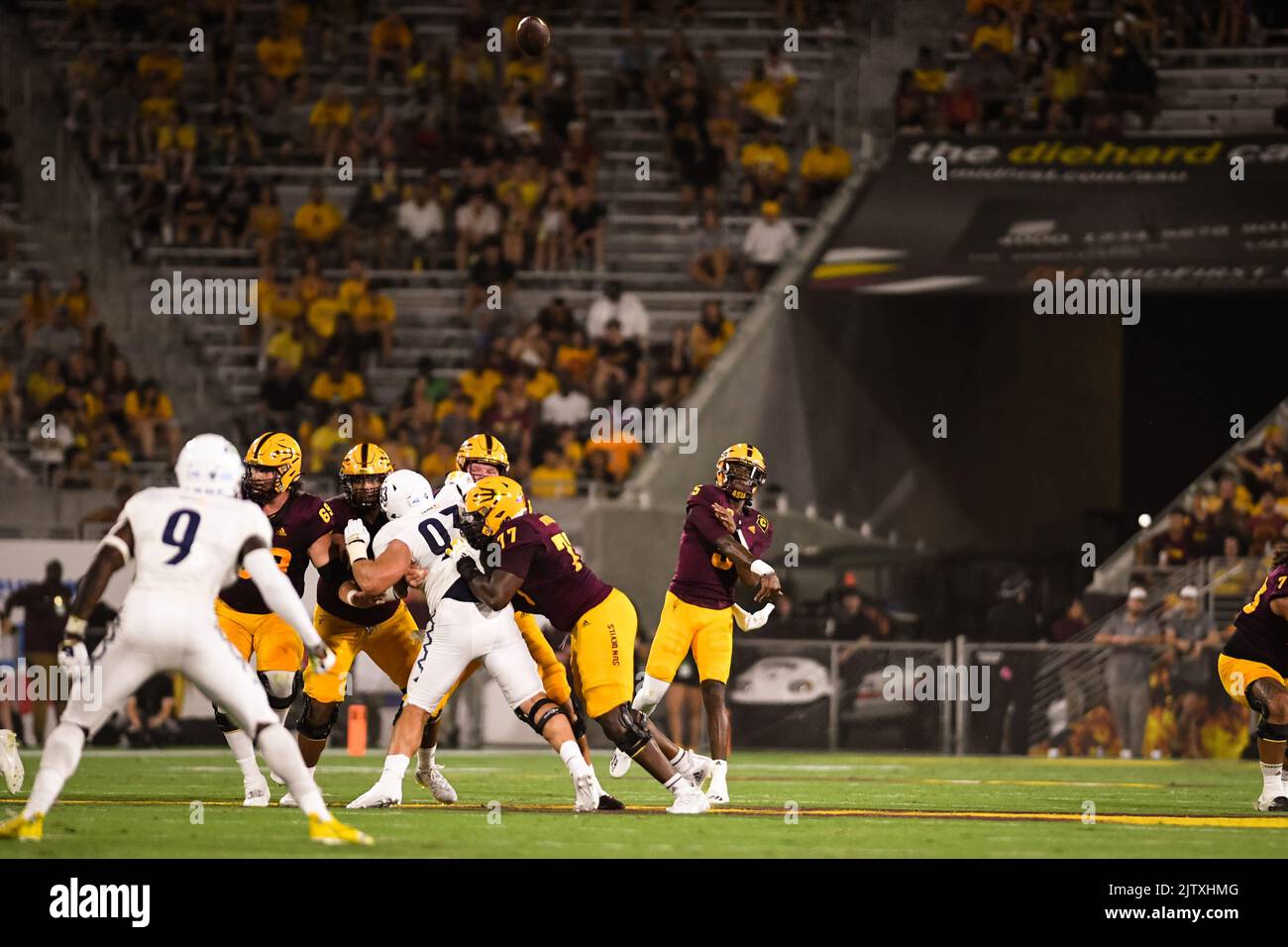 Arizona State quarterback Emory Jones (5) launches a ball downfield in ...