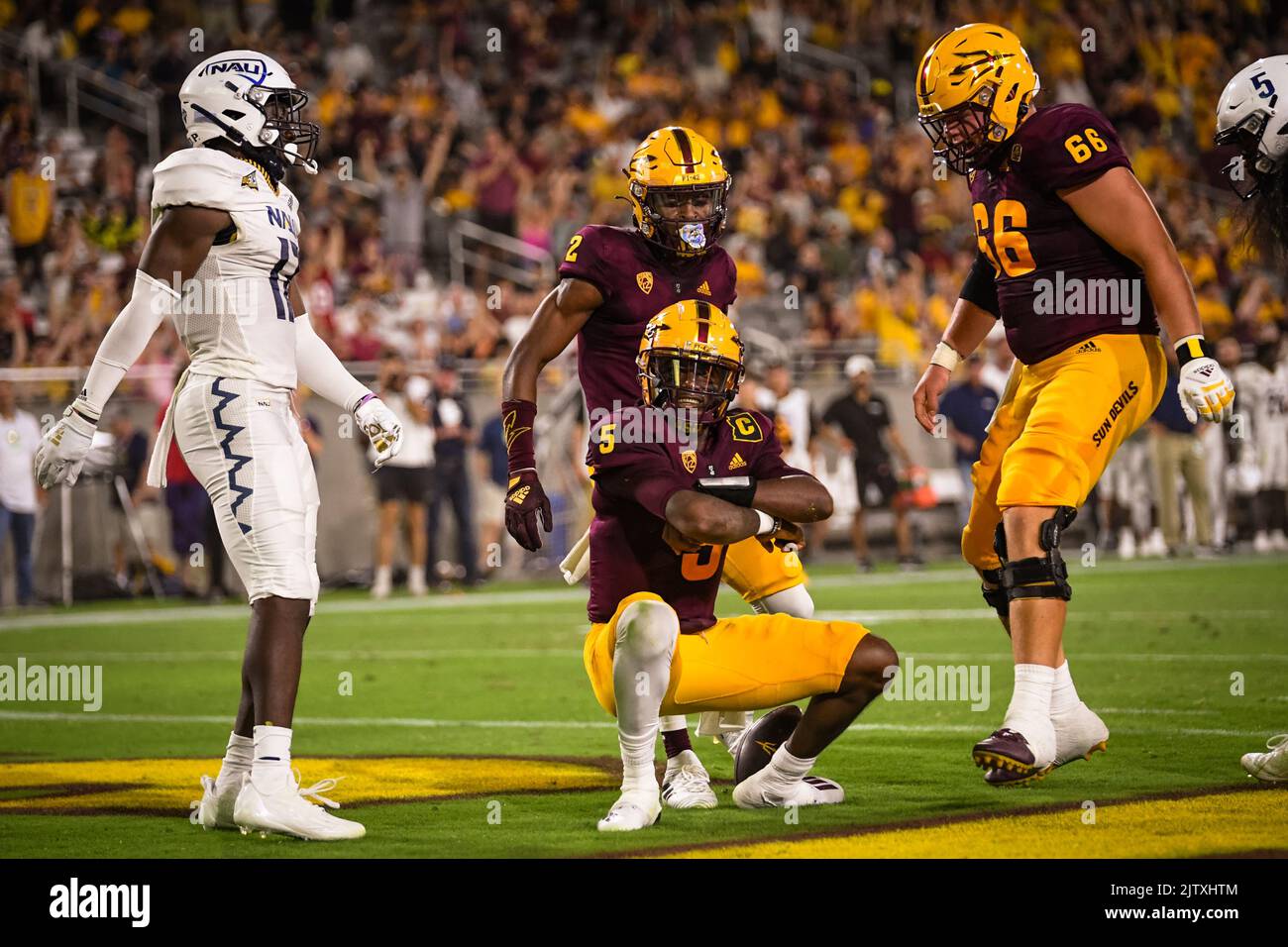 Arizona State quarterback Emory Jones (5) celebrates with his teammates ...