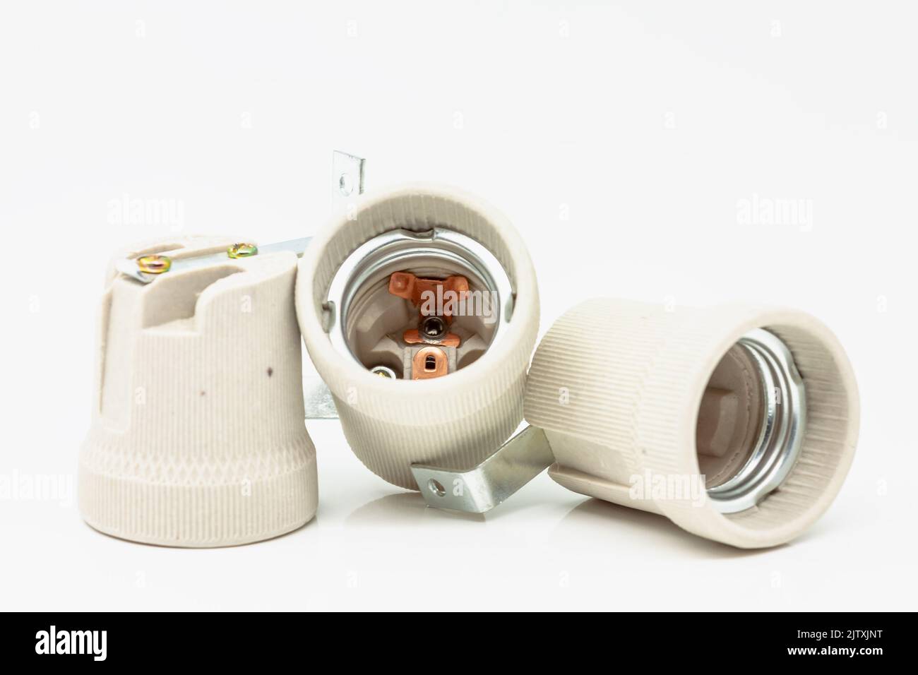 Electric ceramic socket model E27, for lighting. Selective focus with ...