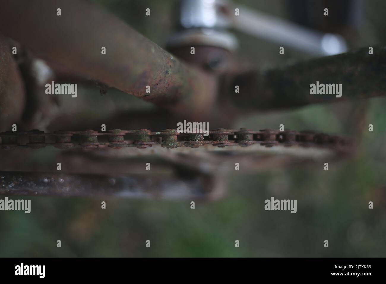 A bird view of an old rusty chain of a brown broke bicycle Stock Photo ...