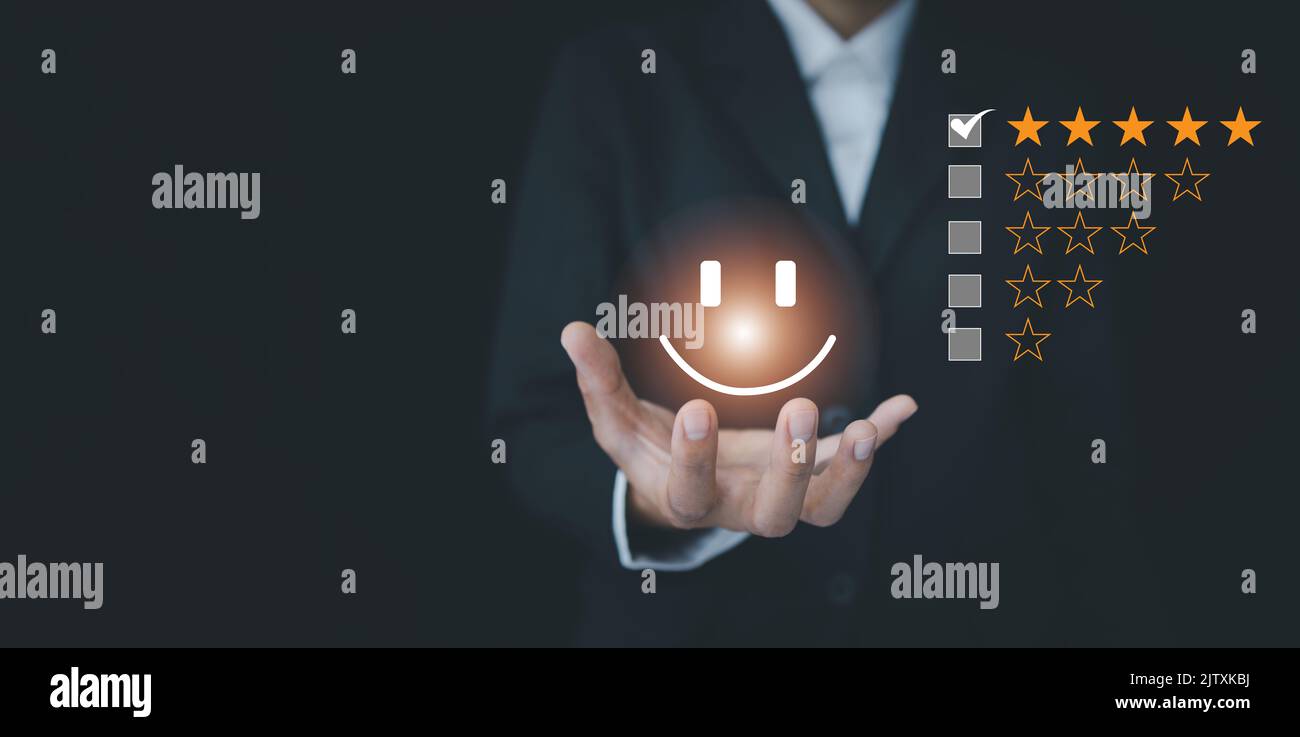 Customer Service Assessment Concept. Businessman holding smiley face ...