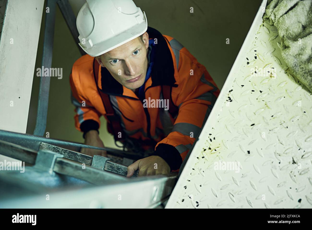 Construction worker climbing ladder hi-res stock photography and images ...