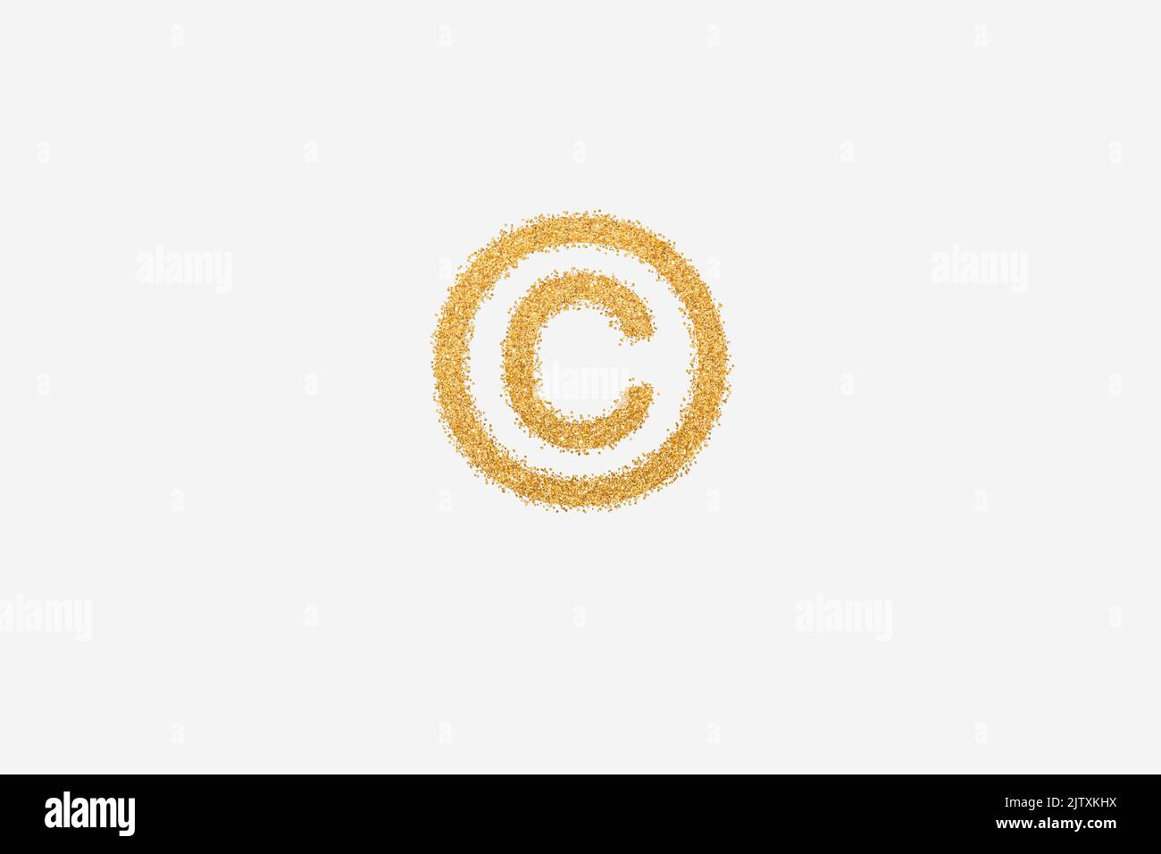 Copyright symbol made of golden glitter against plain background Stock ...